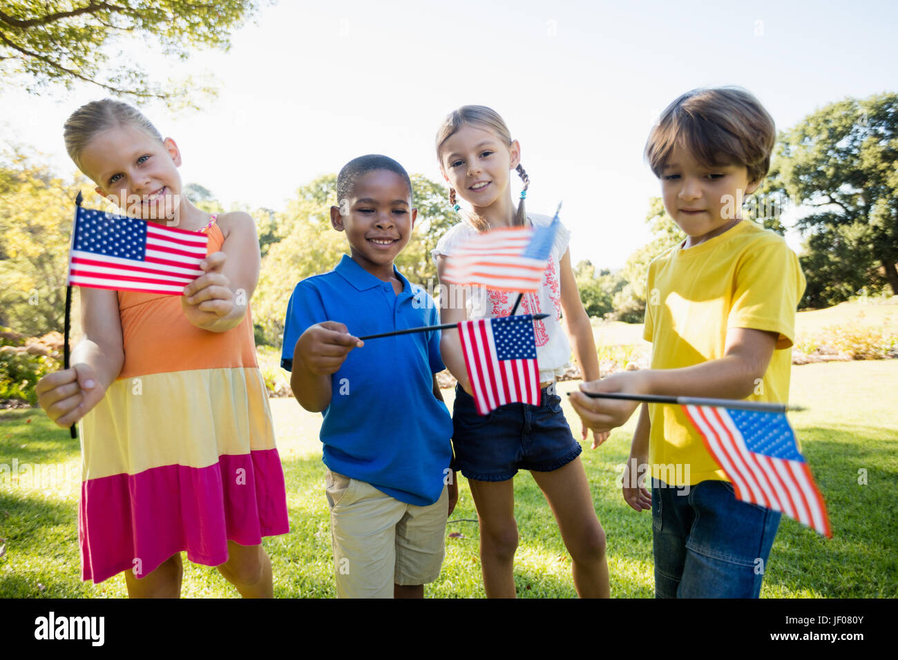 Happy children showing usa flag Stock Photo - Alamy
