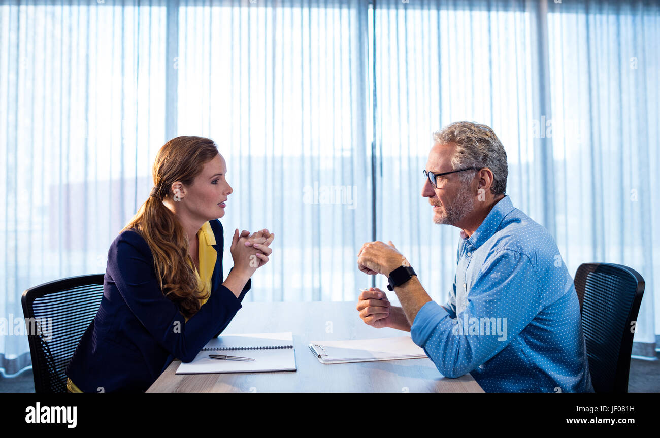 Two businessmen interacting Stock Photo - Alamy