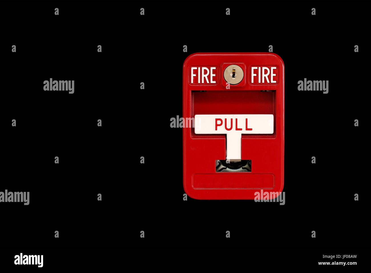 red fire alarm box on black background Stock Photo - Alamy