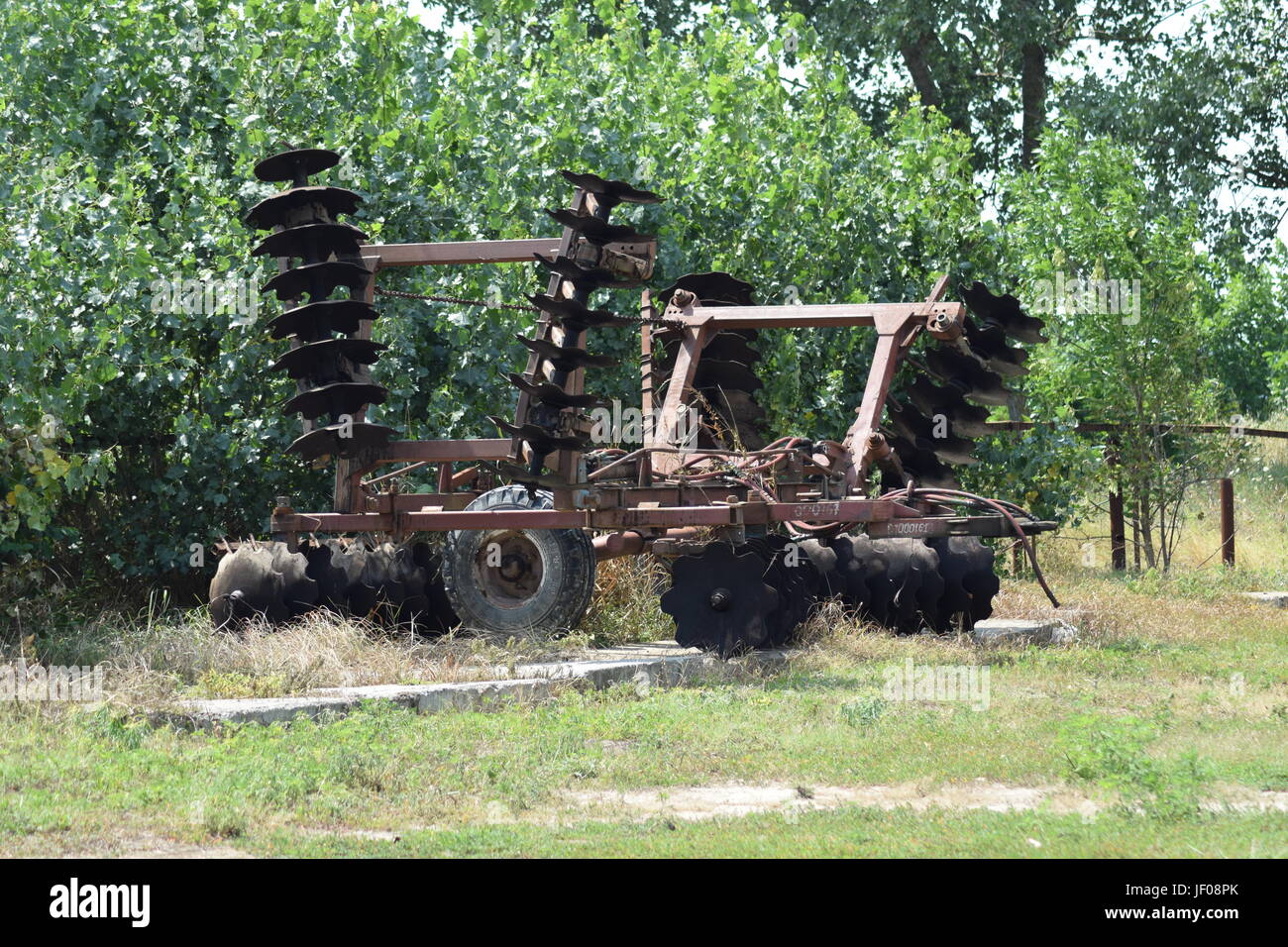 The disk harrow. Agricultural machinery for processing of the soil in ...