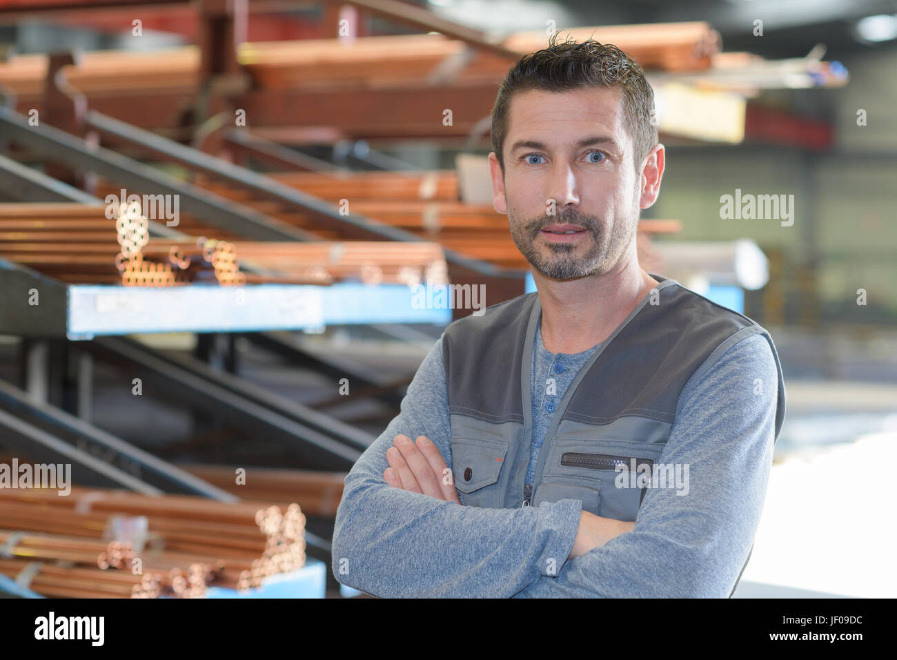 full length portrait of young worker with wrench in industry Stock ...