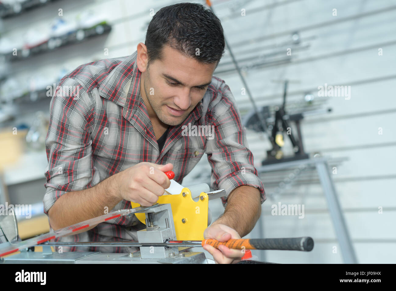 man cut metal tool Stock Photo - Alamy