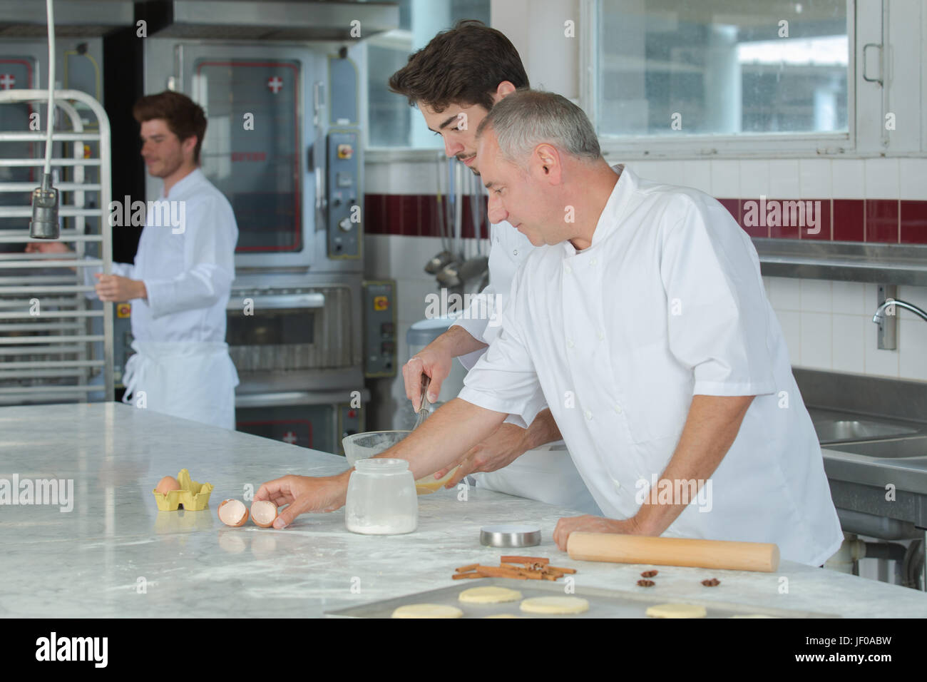 Professional chefs making pastry Stock Photo - Alamy
