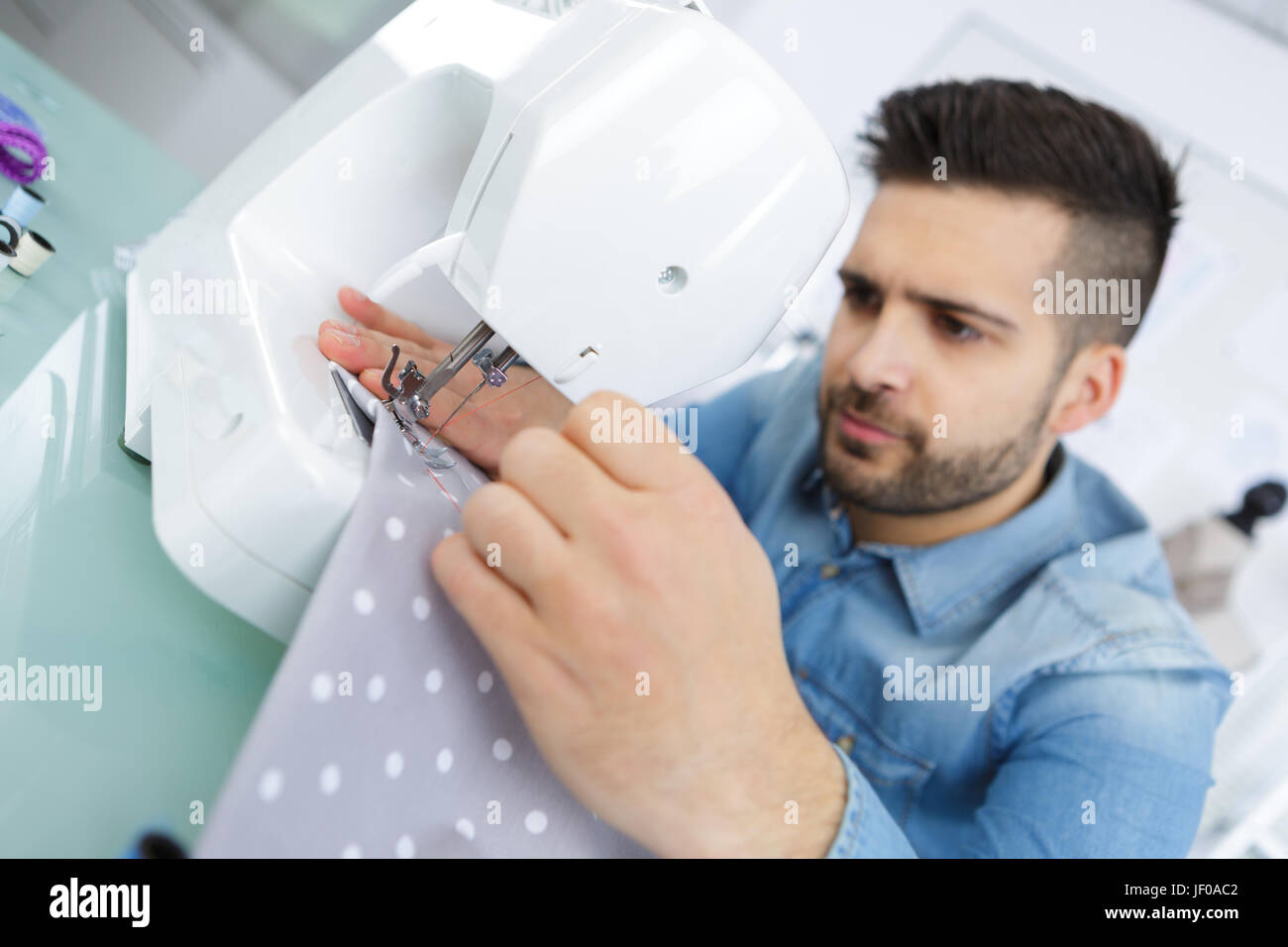 adjusting the cloth Stock Photo - Alamy
