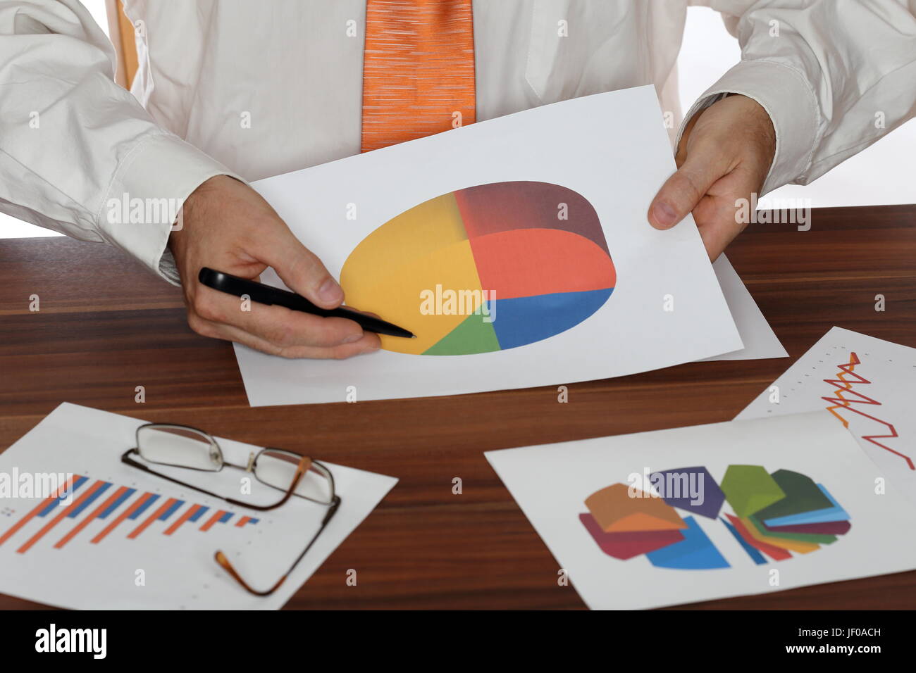 working on a graph Stock Photo - Alamy