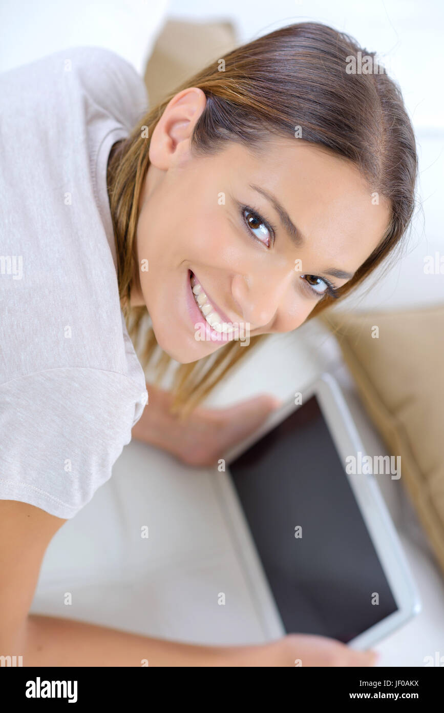 Portrait of woman using tablet Stock Photo - Alamy