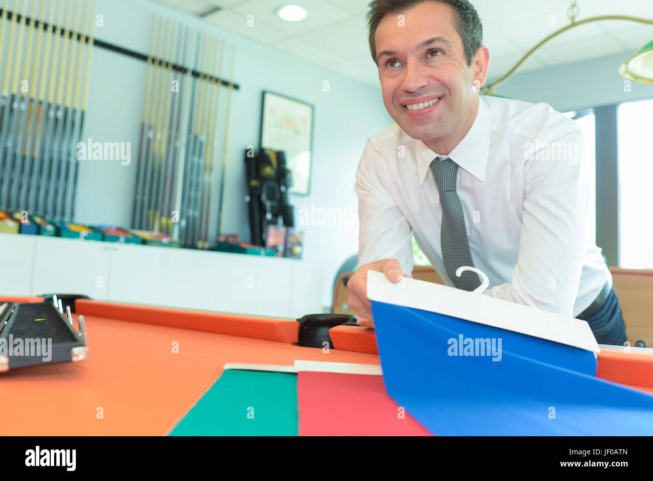 Salesman showing samples Stock Photo - Alamy