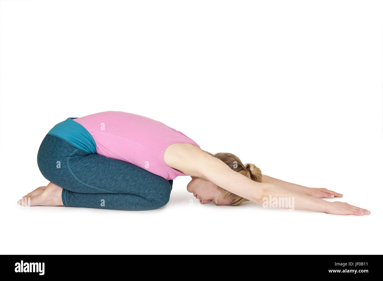Yoga woman pink position 96 Stock Photo - Alamy