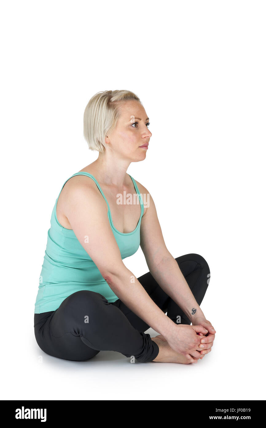 Yoga woman green position 74 Stock Photo - Alamy