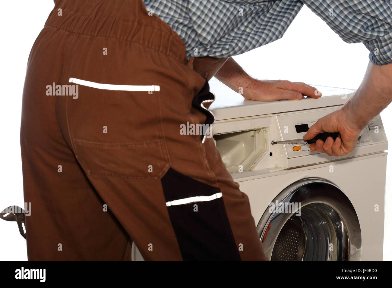 fixing a washer Stock Photo - Alamy