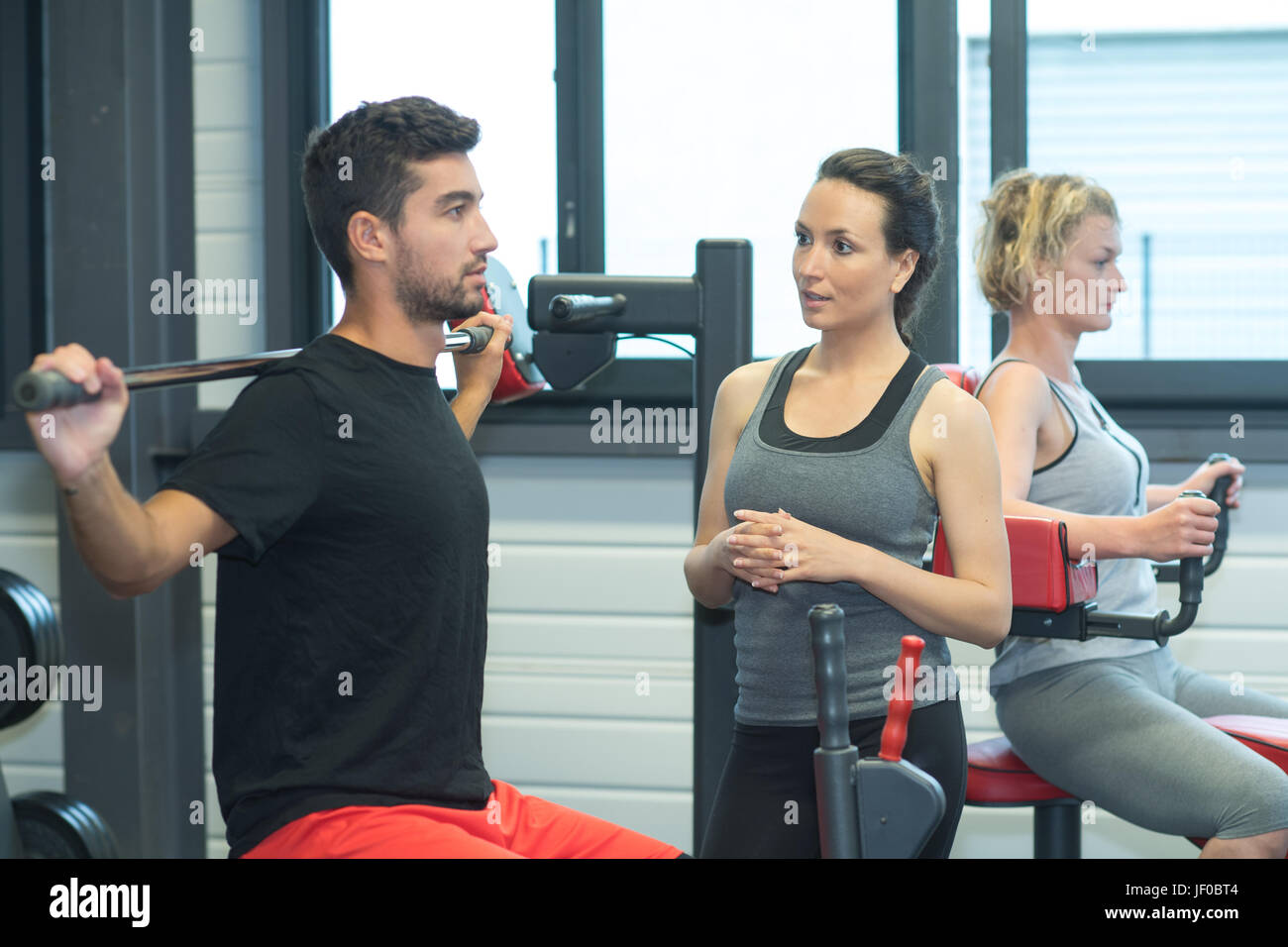 People exercising in the gym Stock Photo - Alamy