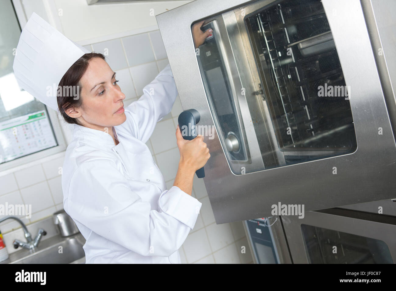 Industrial worker and coat and hat hi-res stock photography and images ...