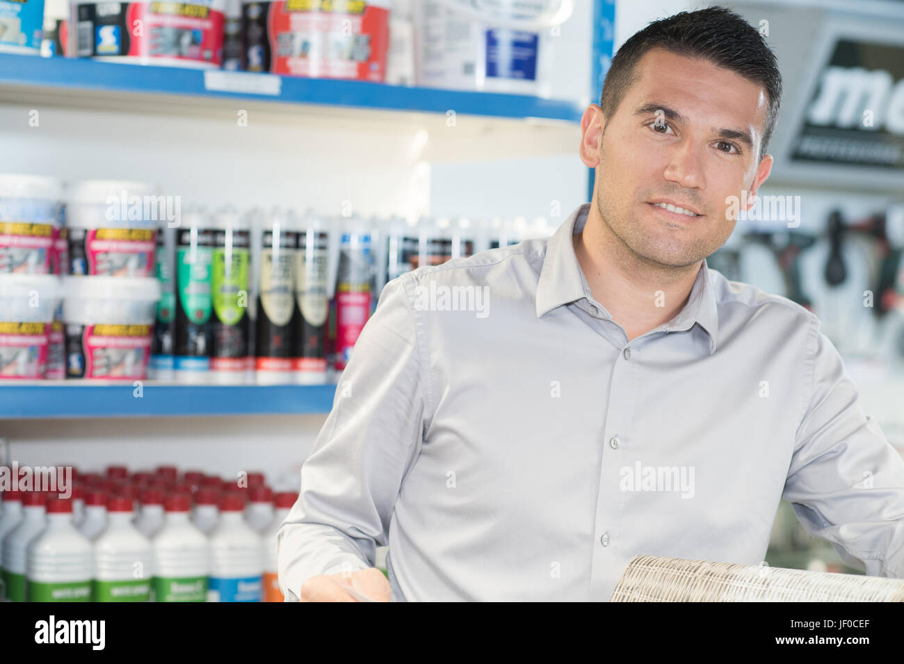 Portrait of shopkeeper Stock Photo - Alamy