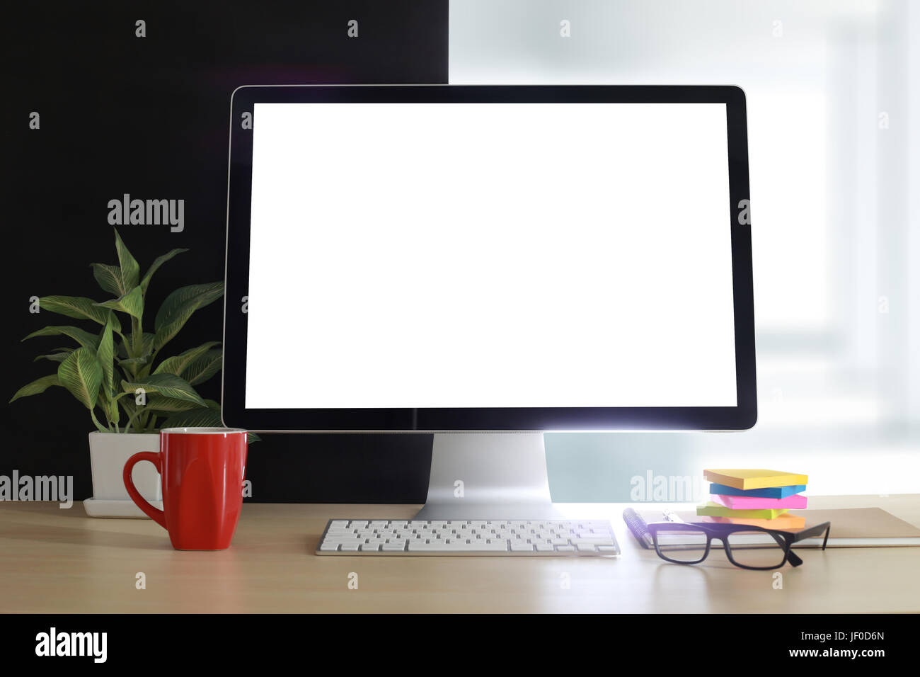working Businessman using a desktop computer of the blank screen Stock ...