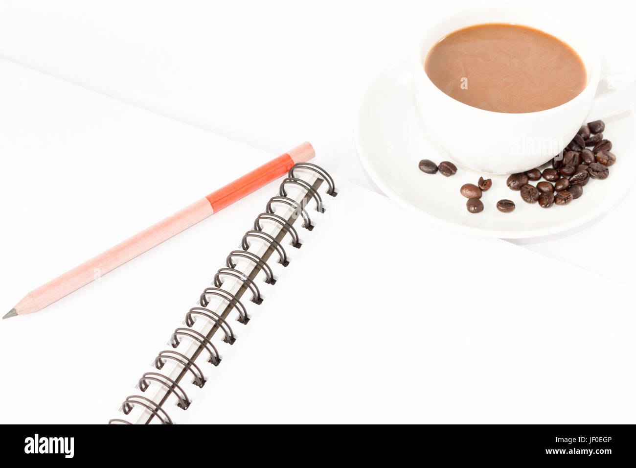 Coffee cup and pencil note isolated on a white background Stock Photo ...