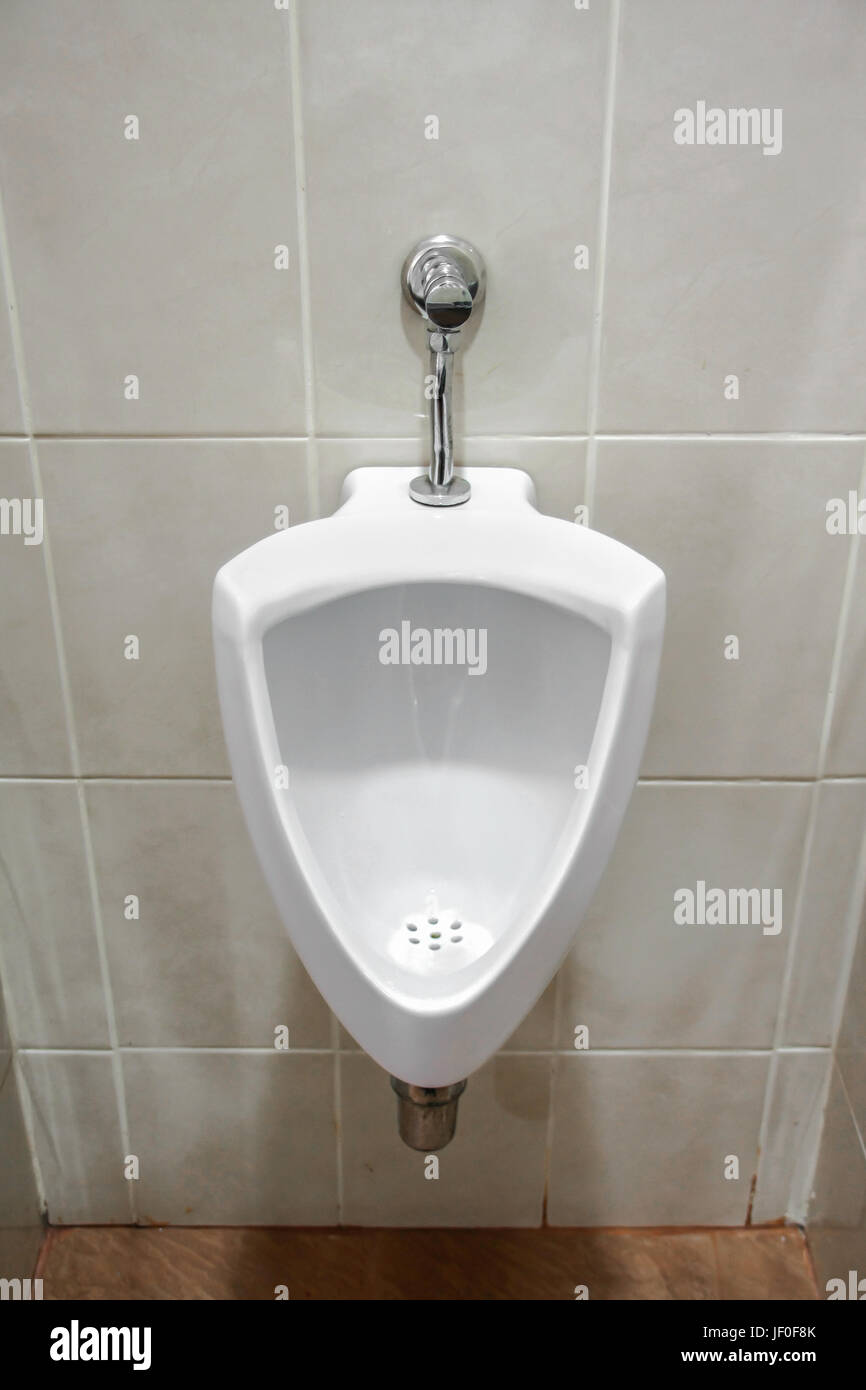 modern style white ceramic urinal in toilet for urine of men Stock ...