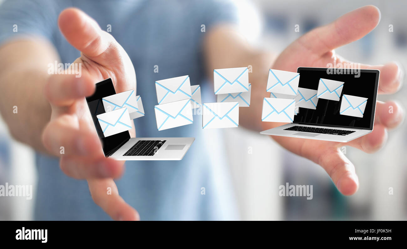 Businessman on blurred background receiving e-mails on his digital ...