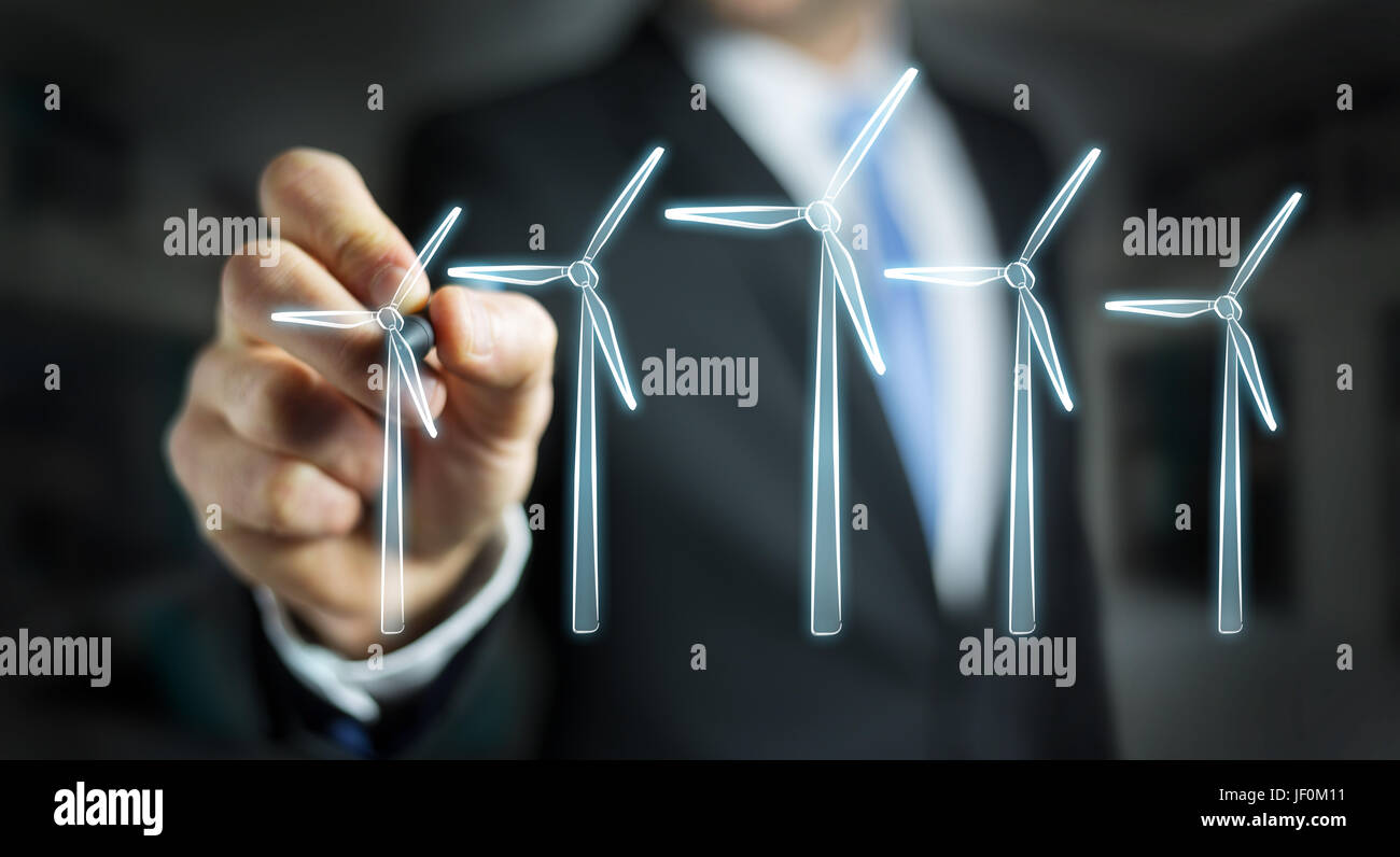 Businessman on blurred background drawing renewable energy sketch Stock ...