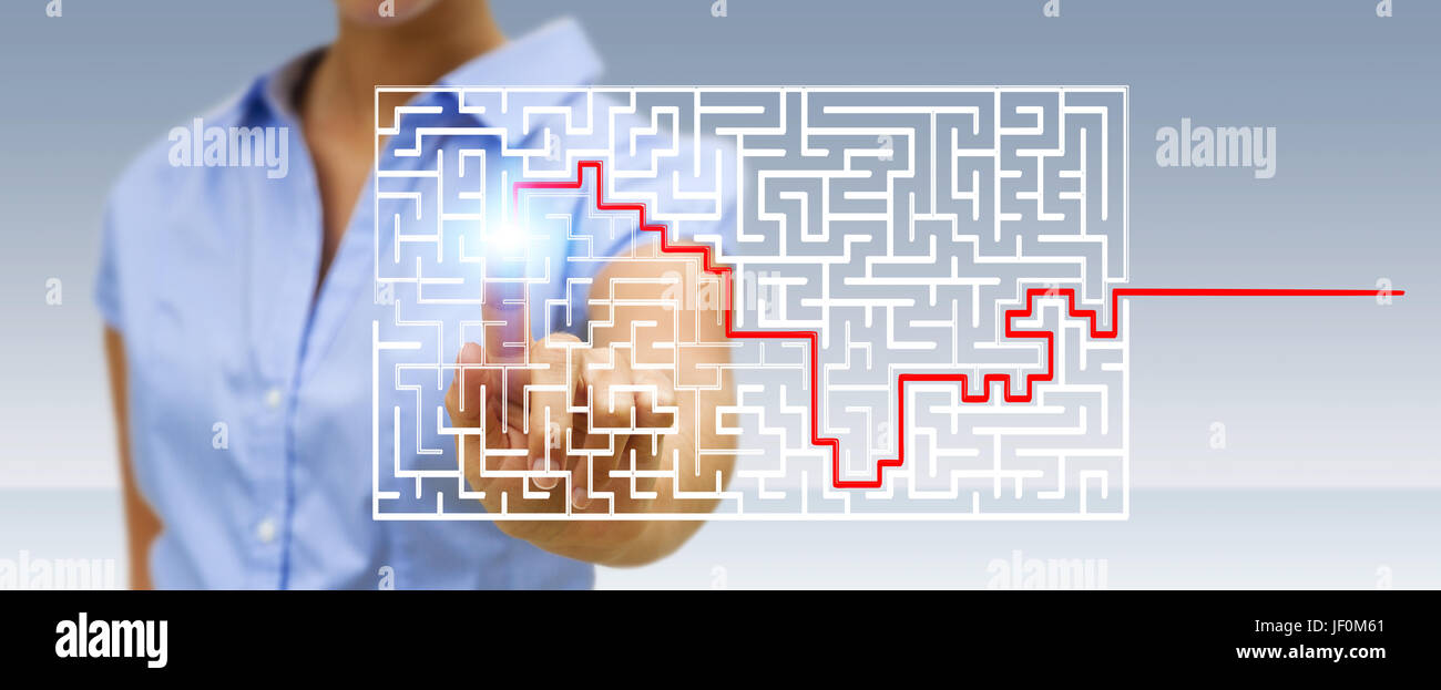 Businesswoman on blurred background searching solution of a complicated ...