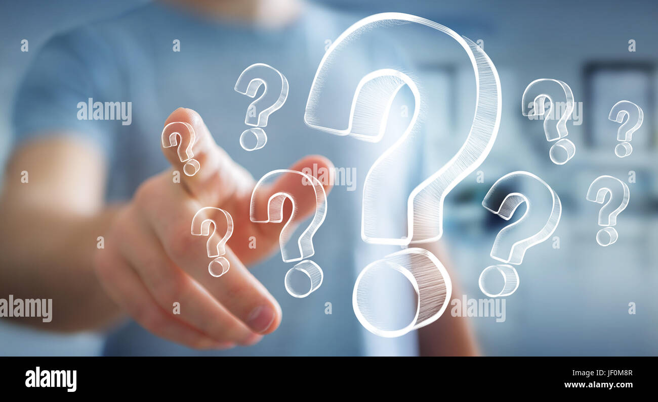 Businessman on blurred background touching hand drawn question marks ...