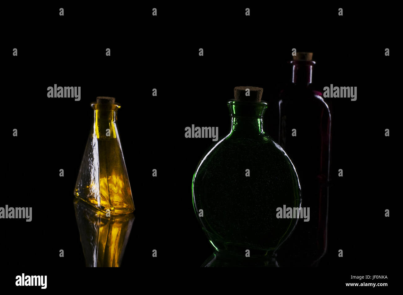 three bottles arrangement Stock Photo - Alamy
