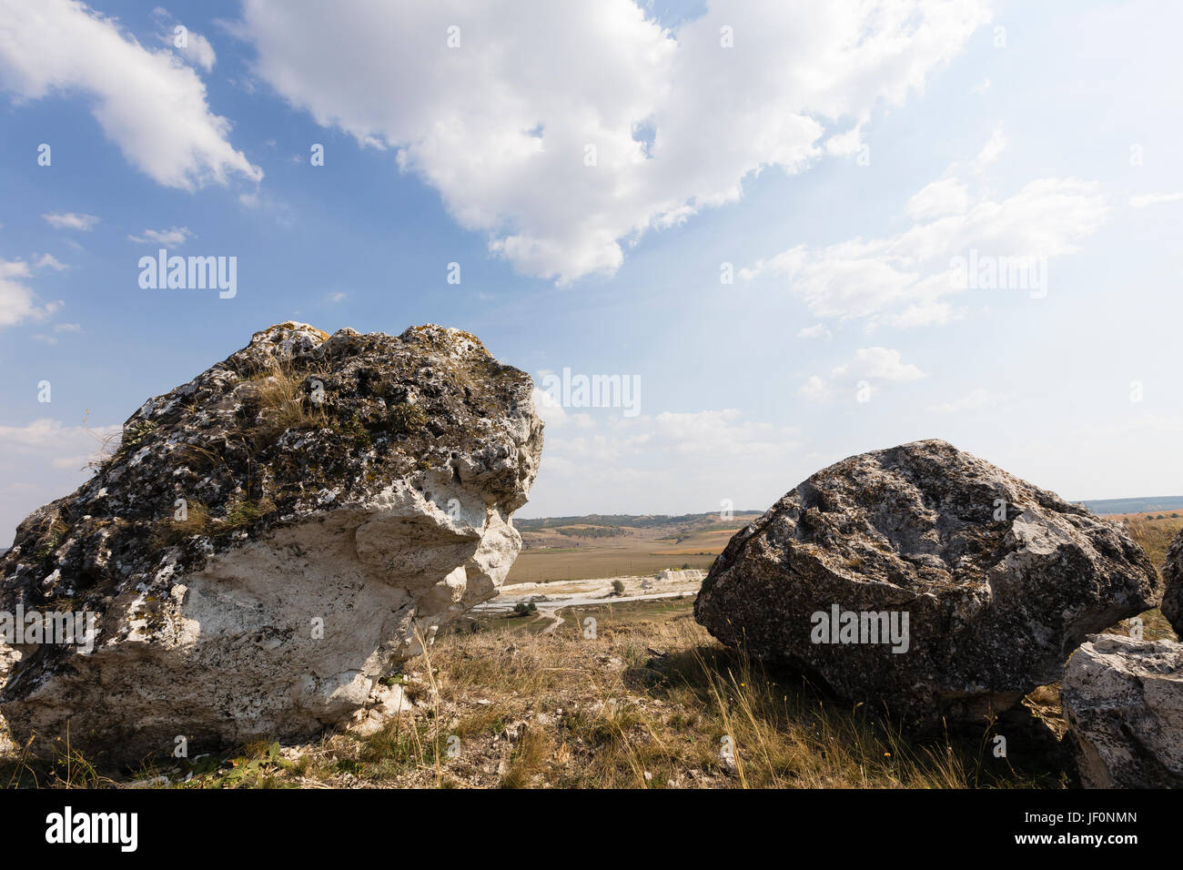 Couple of huge rocks. Huge rocks are close up on the sky background ...