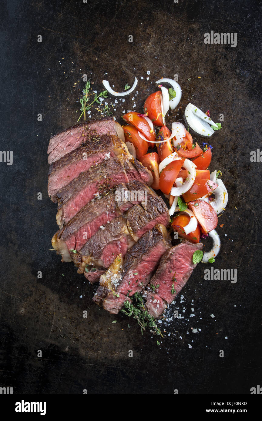 Sliced Dry Aged Rib-Eye Double Steak Stock Photo - Alamy