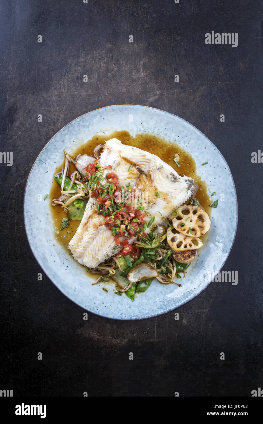 Halibut with Thai Vegetable on Plate Stock Photo - Alamy