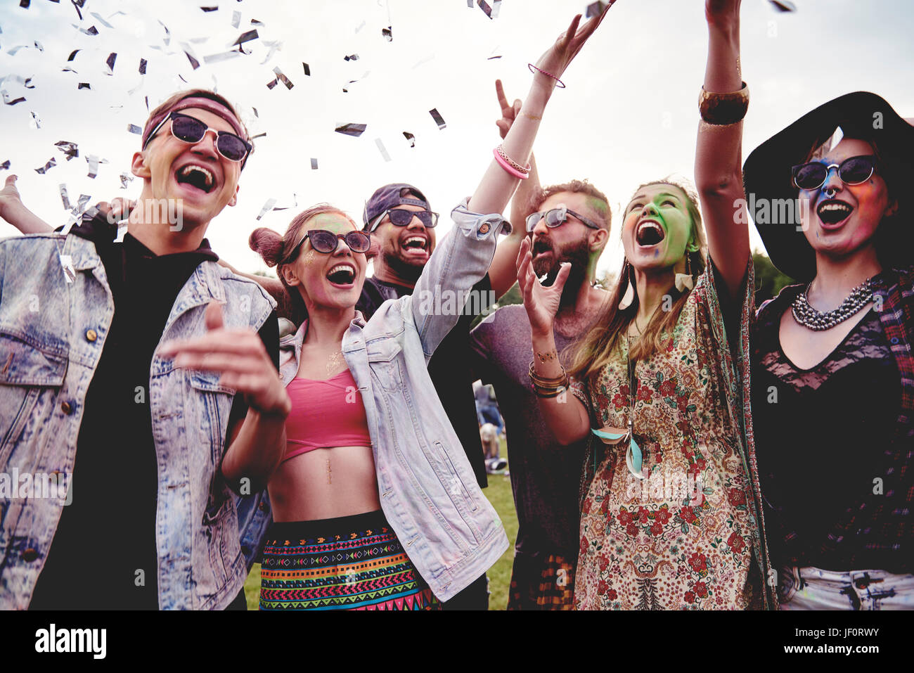 Group of friends having fun at the festival Stock Photo - Alamy