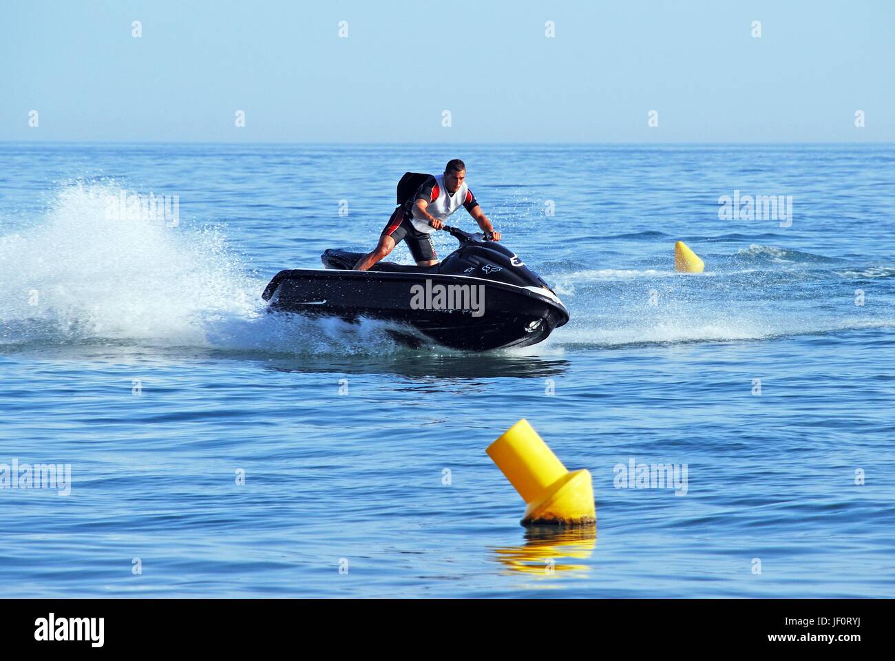 Man riding a jet ski hi-res stock photography and images - Alamy