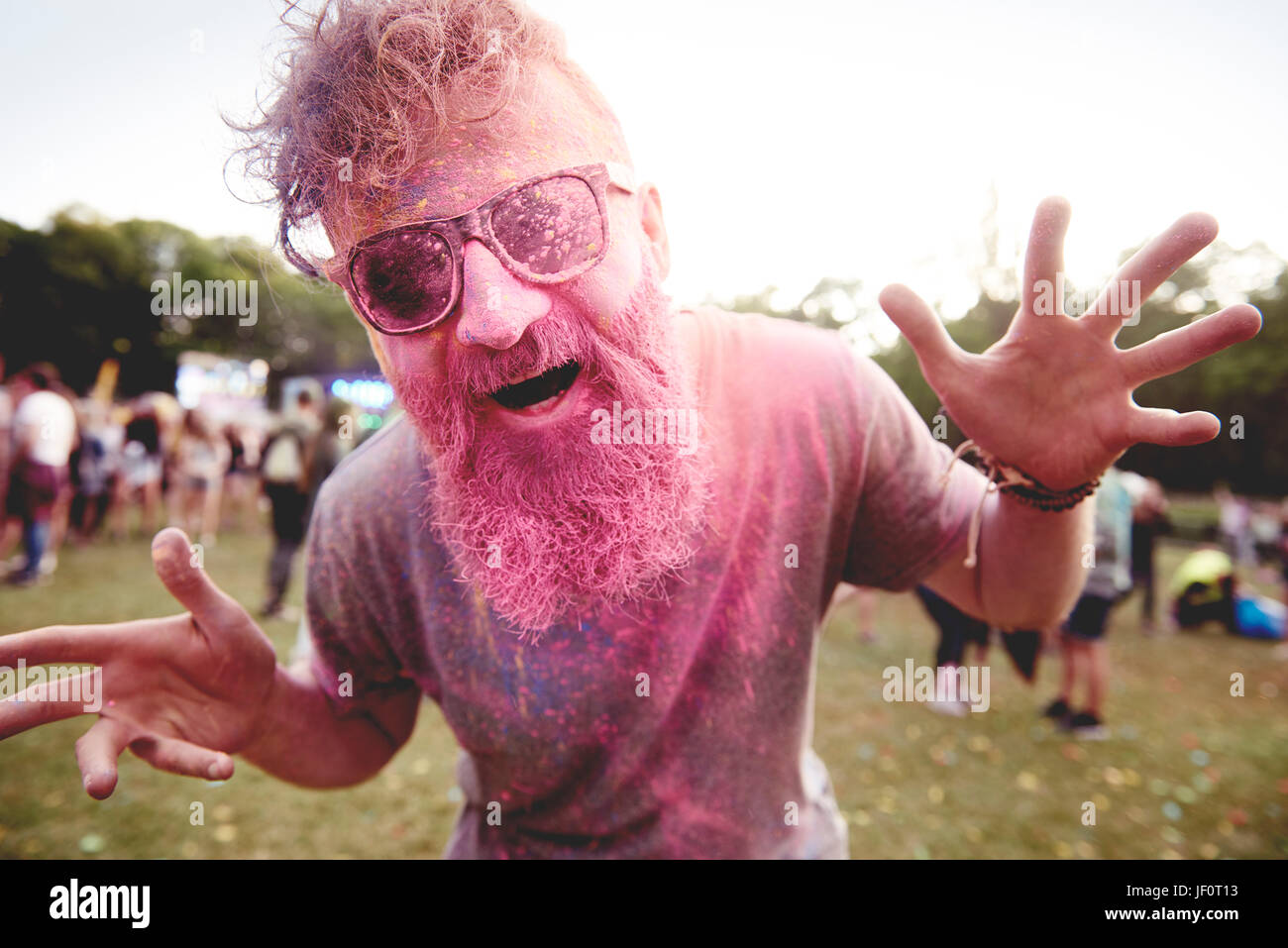 Pink color on the face of man Stock Photo - Alamy