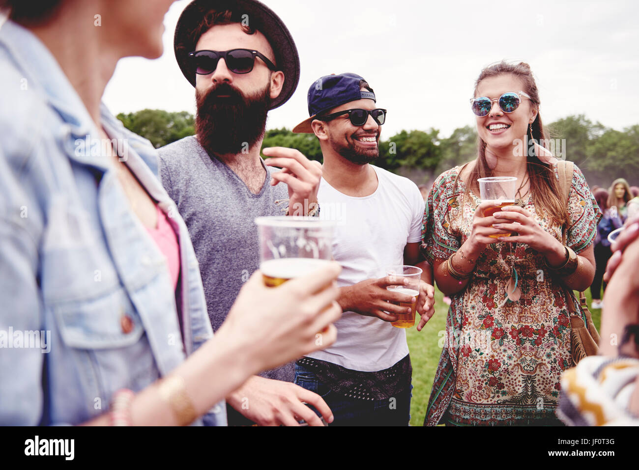 Women talking concert hi-res stock photography and images - Alamy