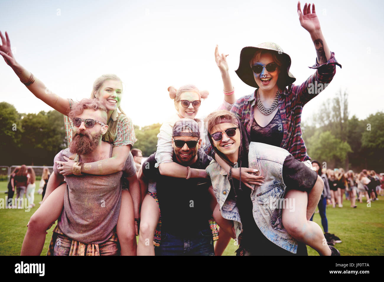 Portrait of group of friends at the festival Stock Photo - Alamy