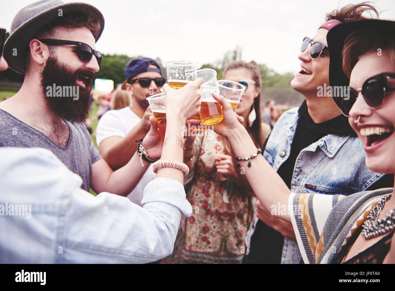 Friends start a party on fresh air Stock Photo - Alamy