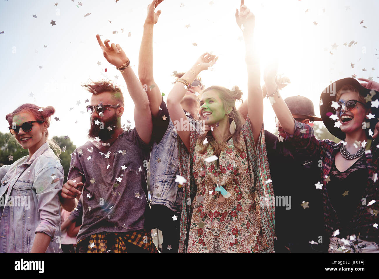 Group of friends celebrating party together Stock Photo - Alamy