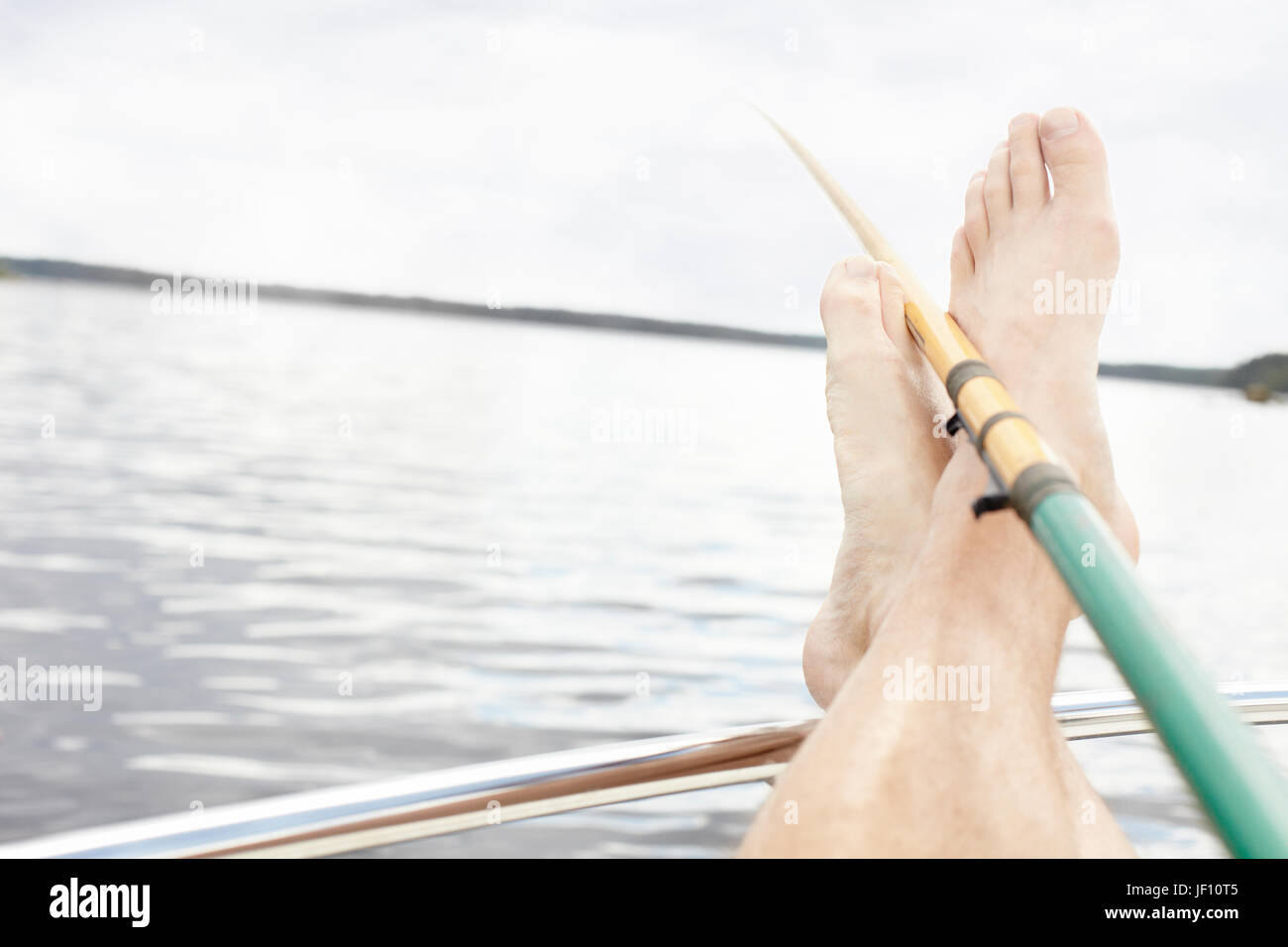 Human feet and boat hi-res stock photography and images - Alamy