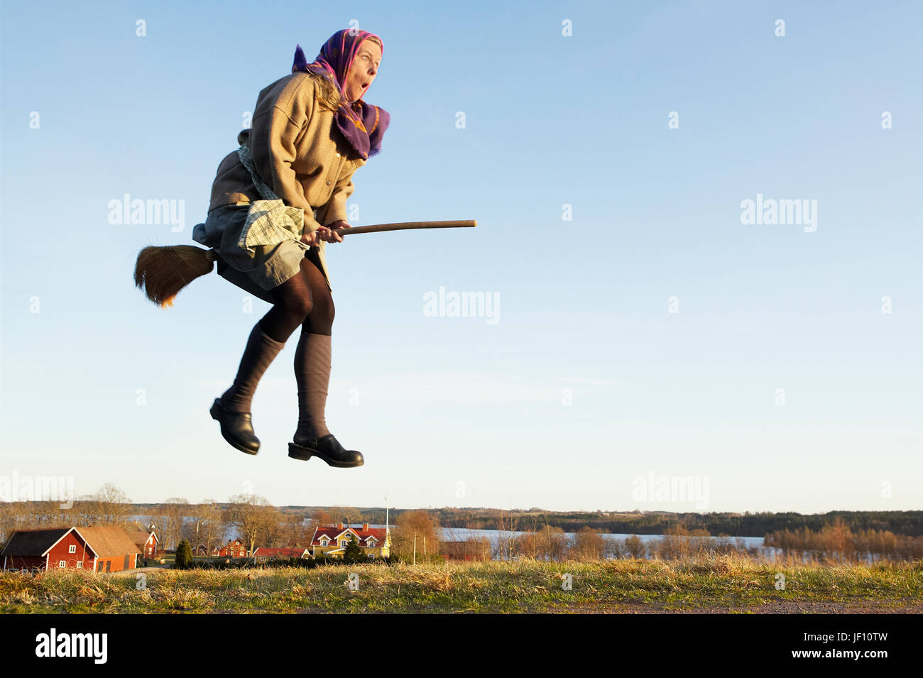 Witch flying on broom Stock Photo - Alamy