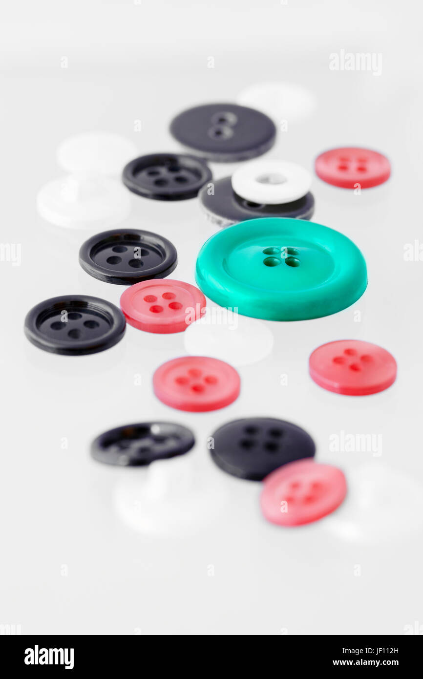 Buttons on white background Stock Photo - Alamy