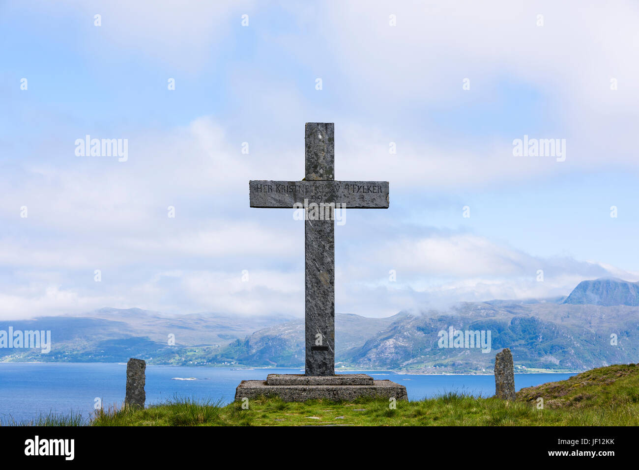 Stone cross at coast Stock Photo - Alamy