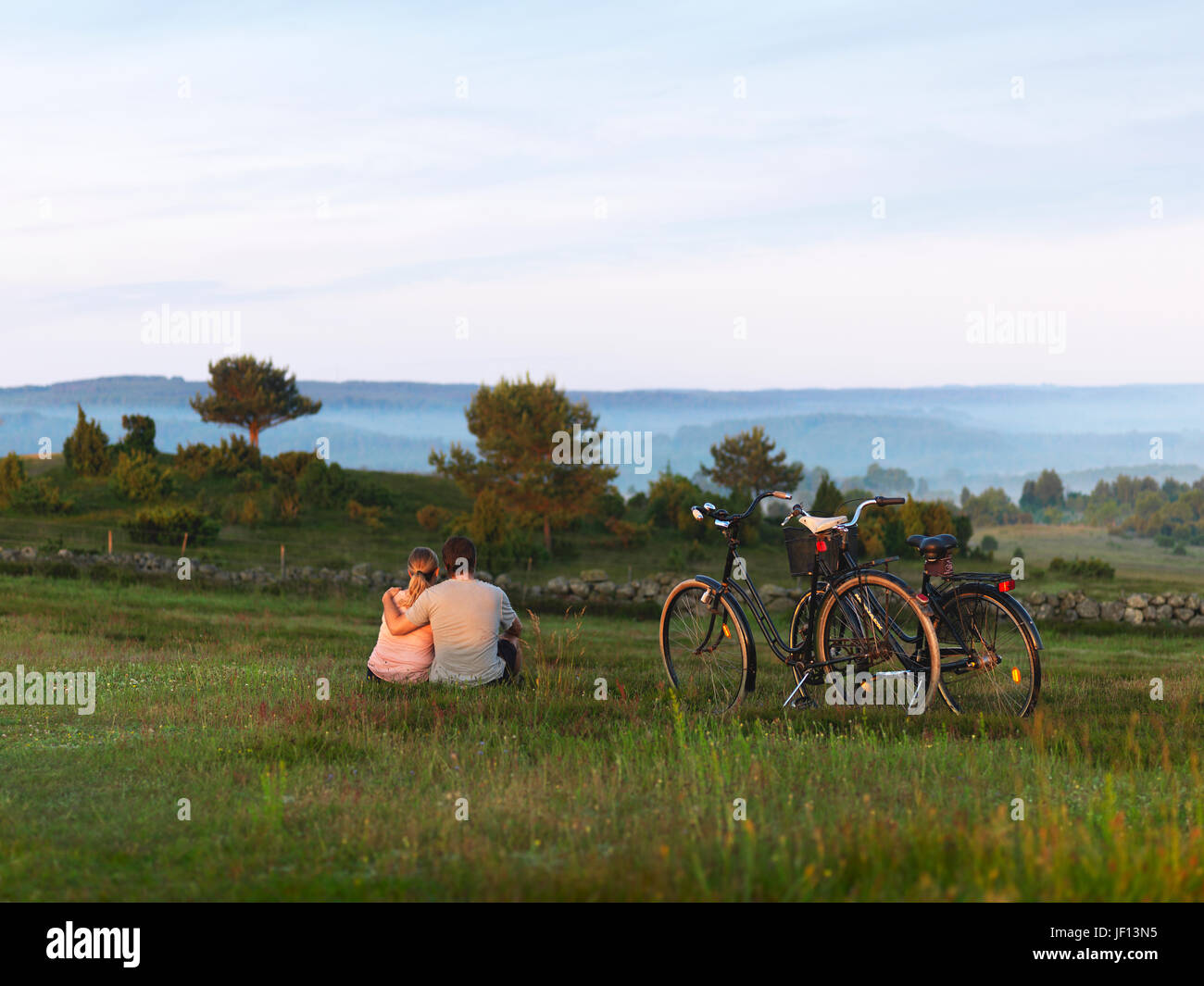 Couple looking at view Stock Photo - Alamy