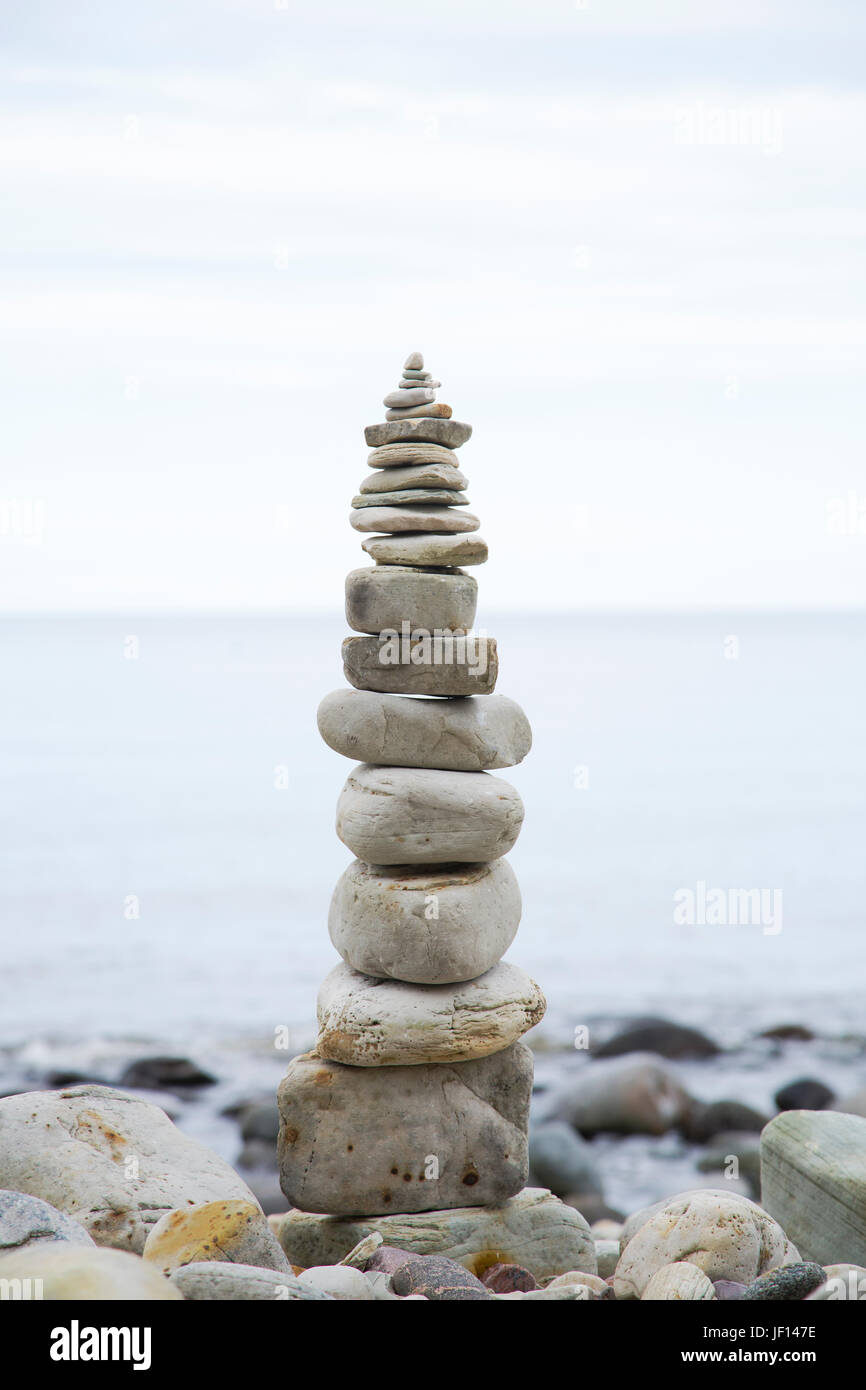 Stack of stones on beach Stock Photo - Alamy