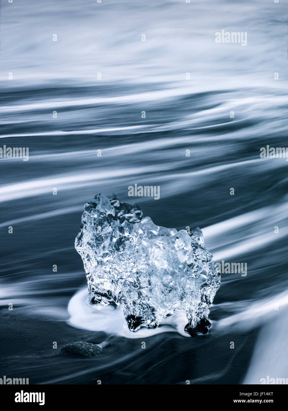Ice on beach Stock Photo - Alamy
