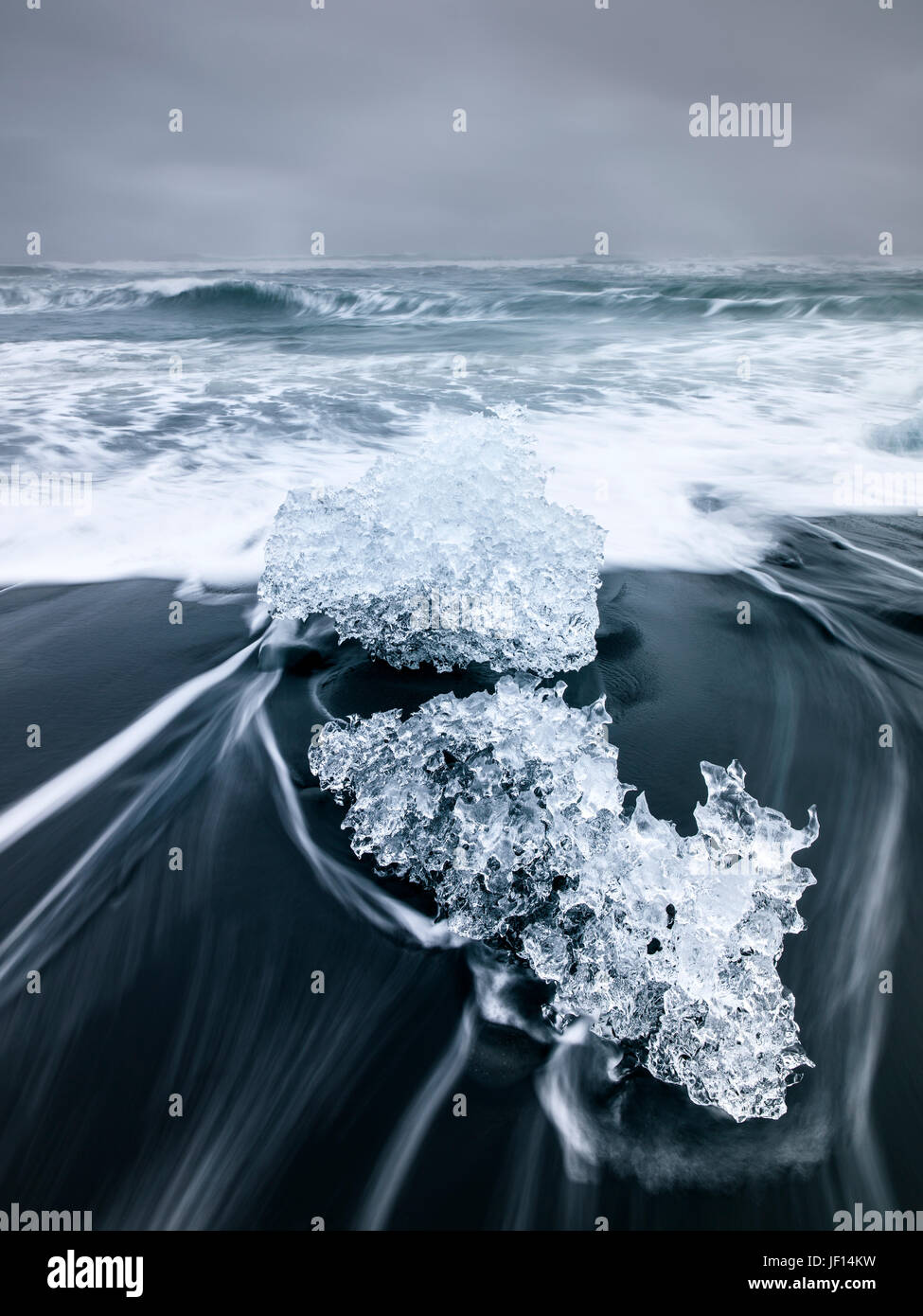 Ice on beach Stock Photo - Alamy