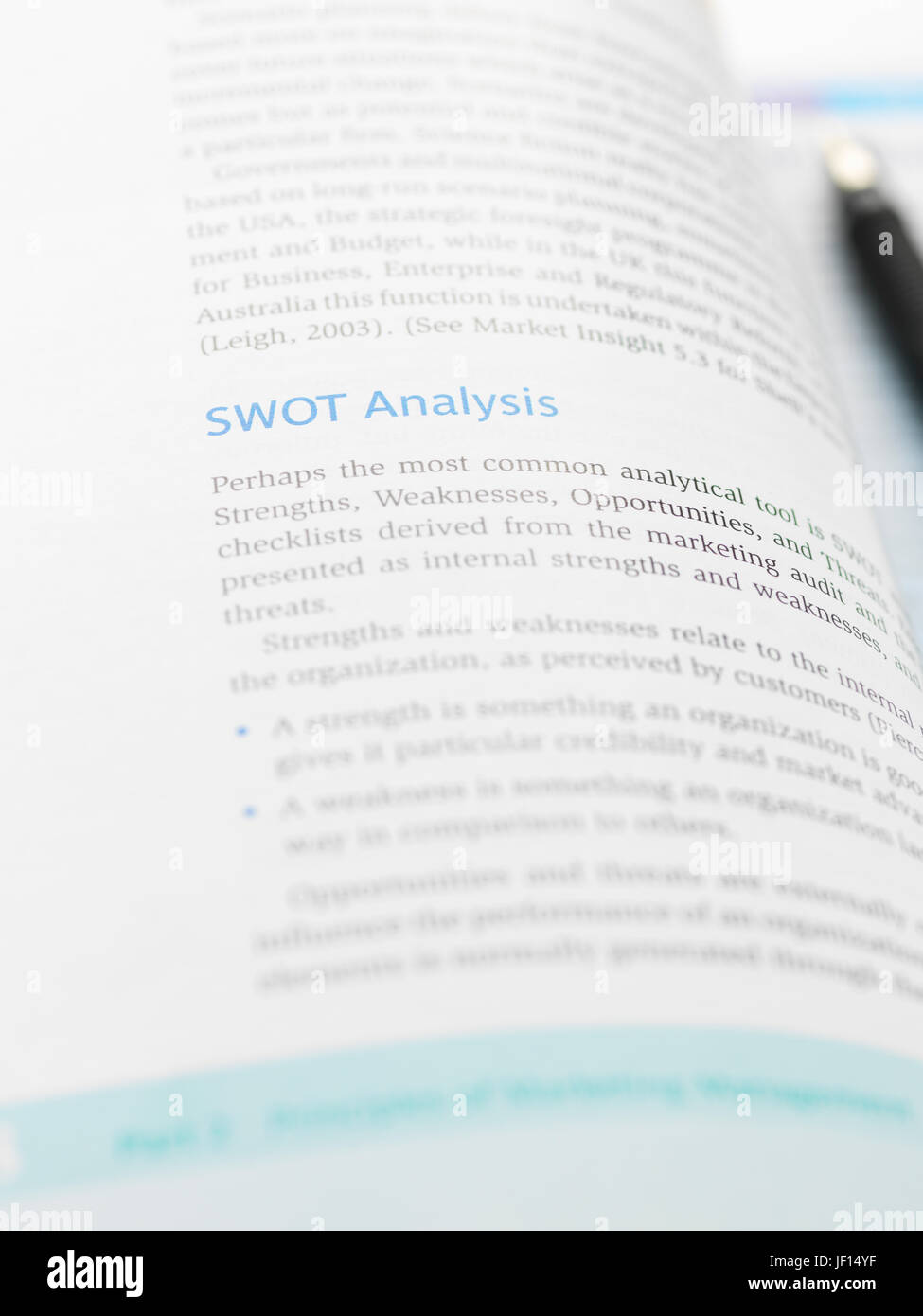 Book with chapter about SWOT analysis Stock Photo - Alamy