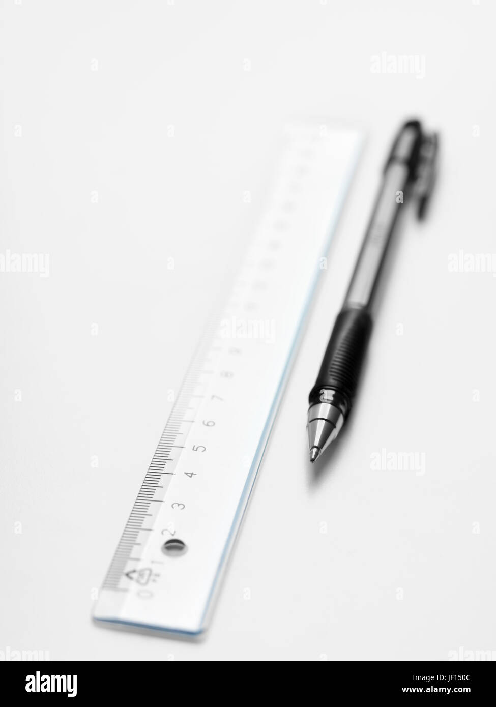 Pen and ruler Stock Photo - Alamy