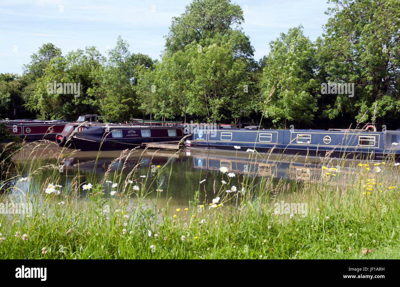 Narrowboats moored at Crick Wharf, Grand Union Canal, Northamptonshire ...