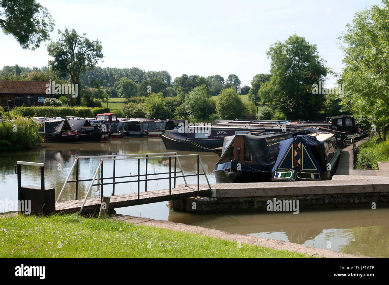 Narrowboats moored at Crick Wharf, Grand Union Canal, Northamptonshire ...