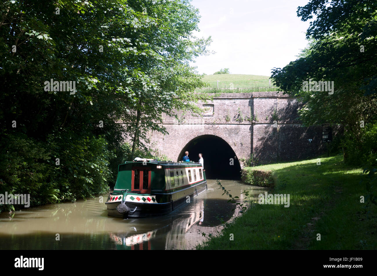 A narrowboat leaving Crick Tunnel on the Grand Union Canal ...