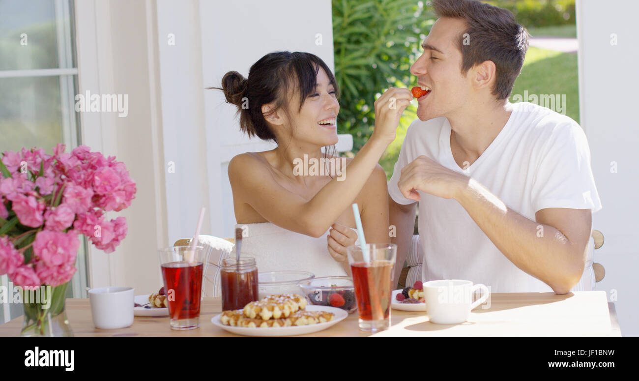Feeding each other hi-res stock photography and images - Alamy