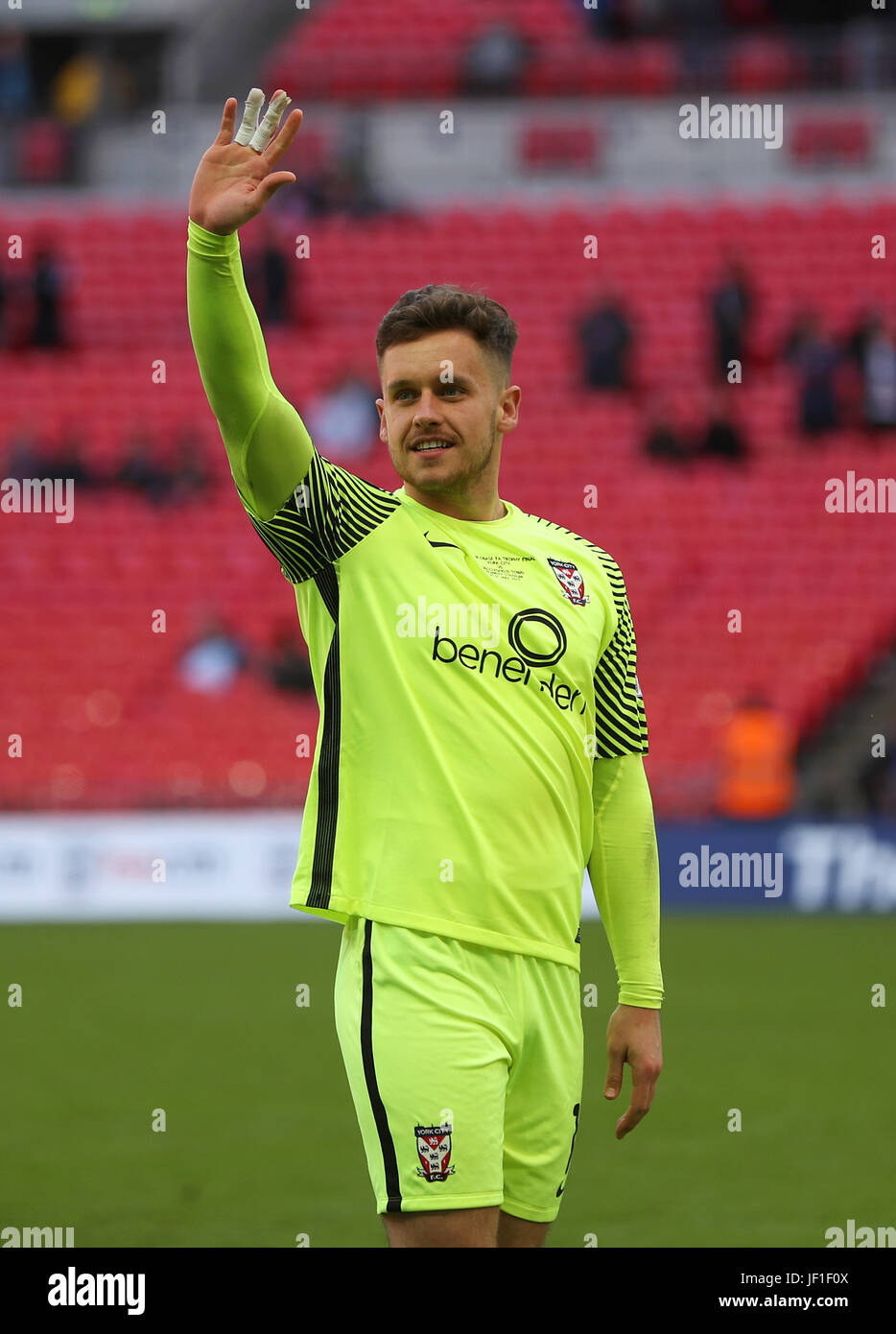 York City goalkeeper Luke Simpson acknowledges the fans after the game ...